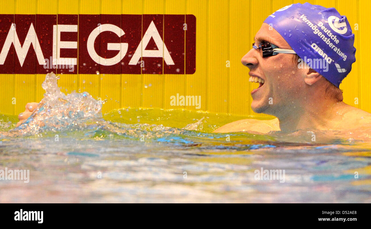 German swimmer Paul Biedermann celebrates his win in the men's 400 ...