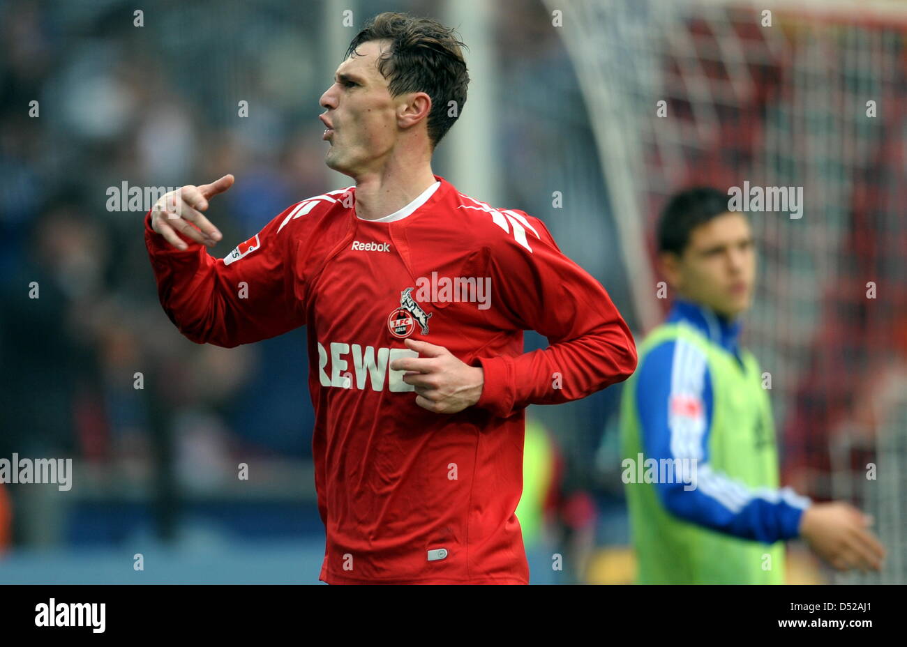 Cologne's Milivoje Novakovic celebrates his 3-2 goal ball during ...
