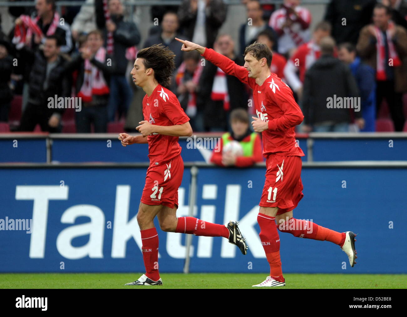 Cologne's Milivoje Novakovic (R) and Pedro Geromel celebrate after the ...