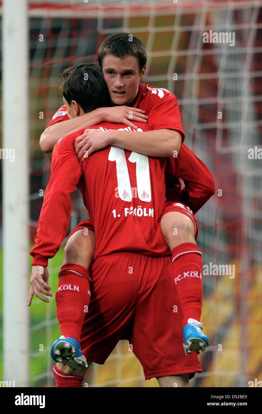 Cologne's Milivoje Novakovic and Christian Clemens celebrate after the ...