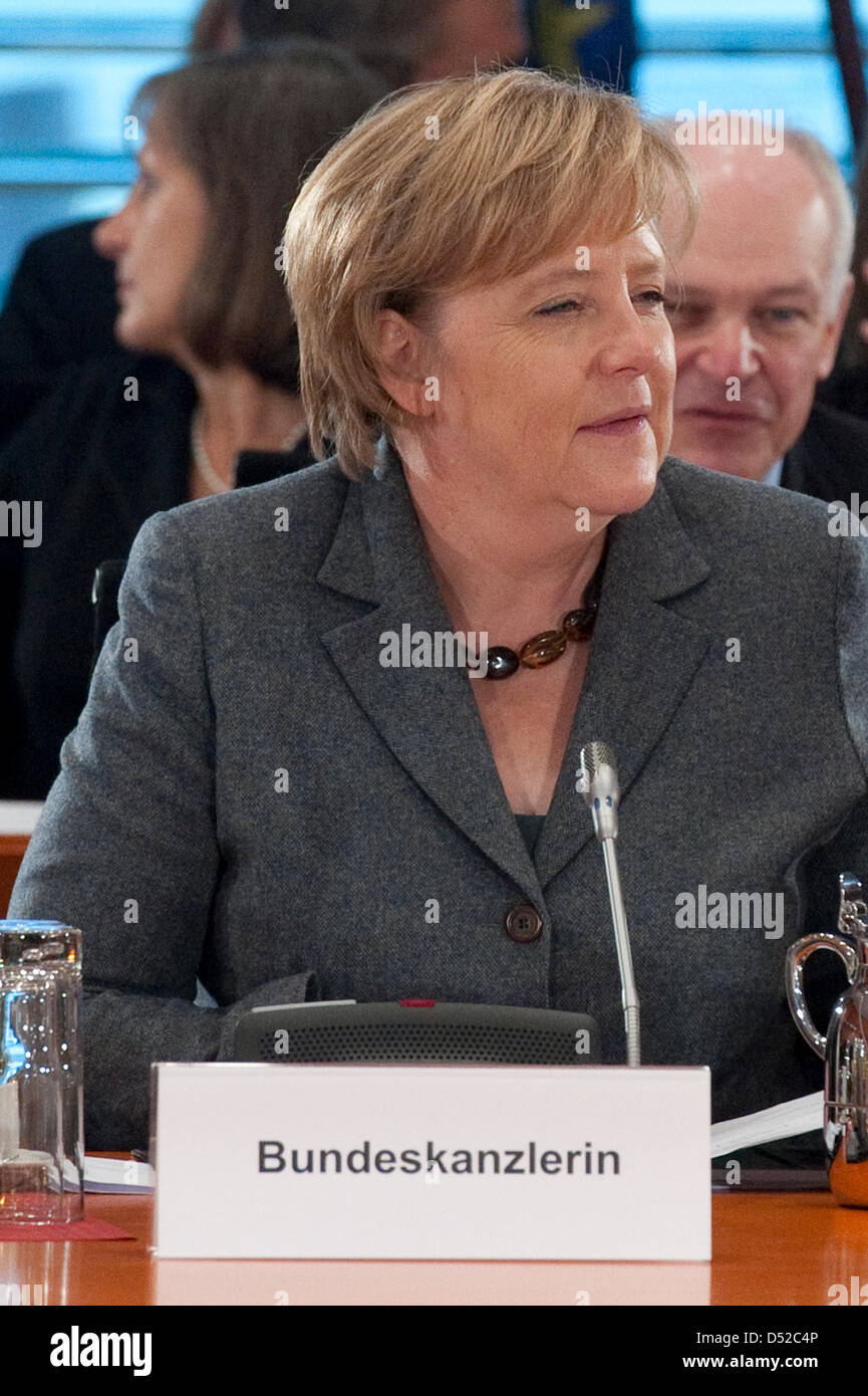 German Chancellor Angela Merkel has taken her seat during a summit ...