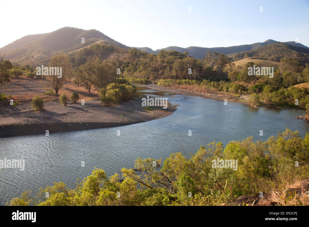 Late afternoon light over a bend in the Macleay River inland from ...