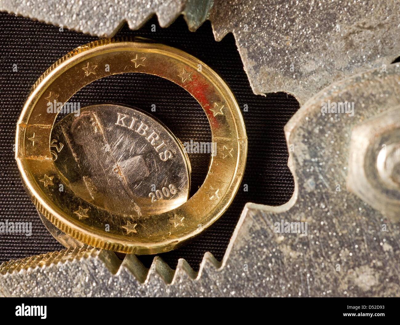 ILLUSTRATION - An illustrated picture shows a bent Cypriot euro coin ...