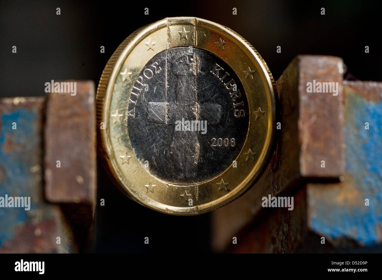 ILLUSTRATION - An illustrated picture shows a bent Cypriot euro coin ...