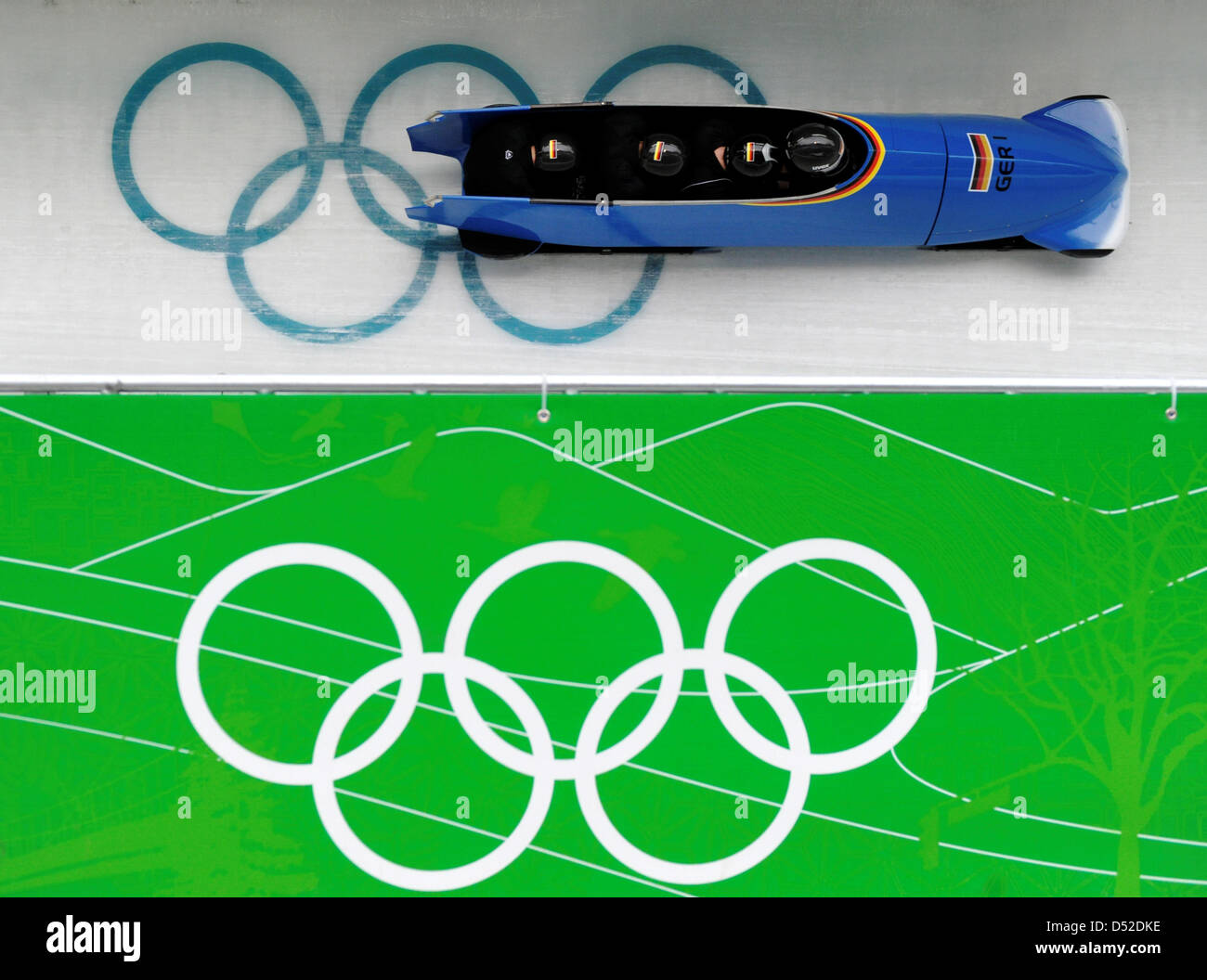 Andre Lange of Germany 1 takes a curve during the Bobsleigh Four-Man ...