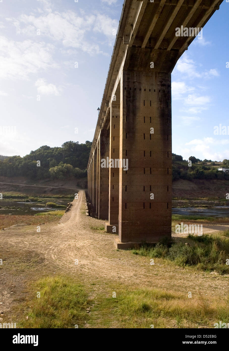 Pillars of a bridge in the Minho river, Galicia, Spain Stock Photo - Alamy