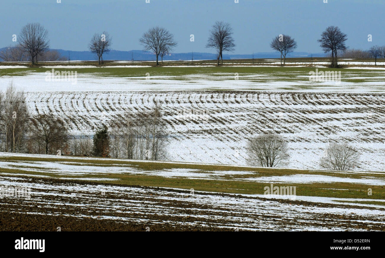 View over thawing fields near Hartenstein, Germany, 25 February 2010 ...