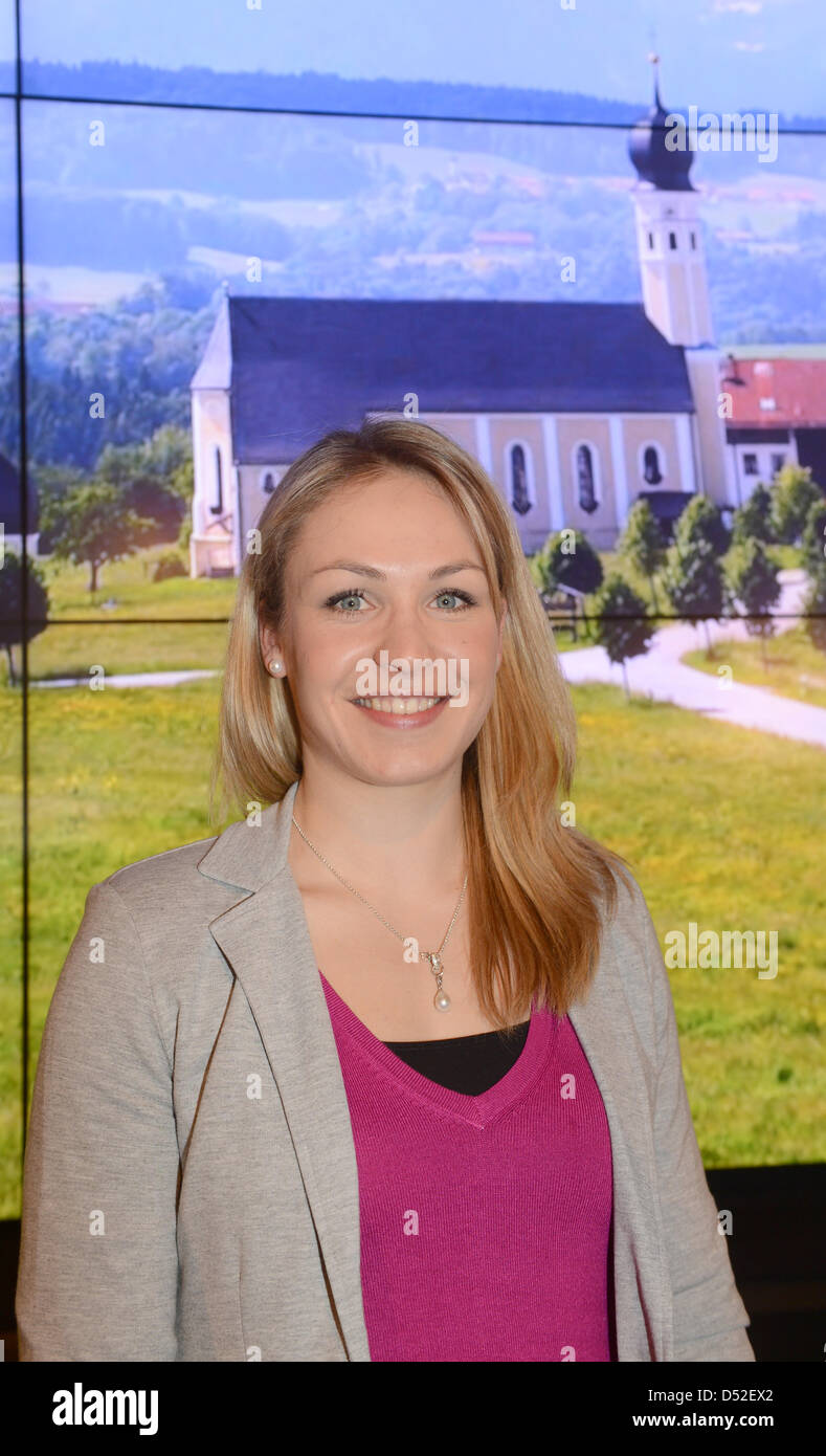 German biathlete Magdalena Neuner poses for photographs during the ...
