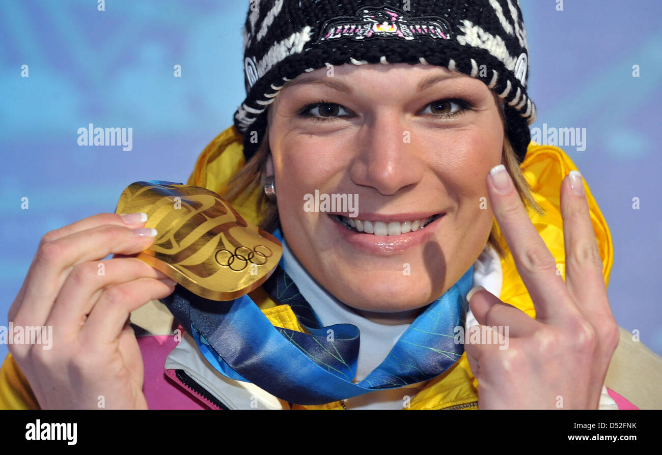 Maria Riesch of Germany celebrates winning the gold medal during the ...
