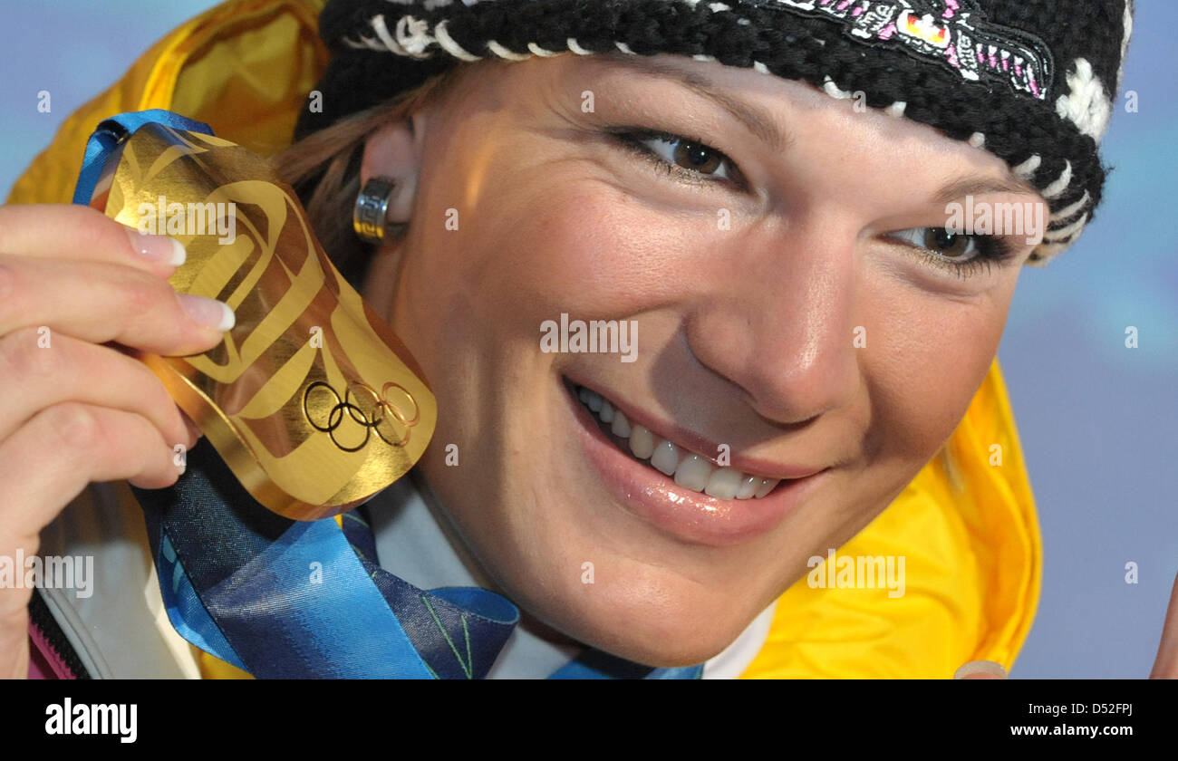 Maria Riesch of Germany celebrates winning the gold medal during the ...