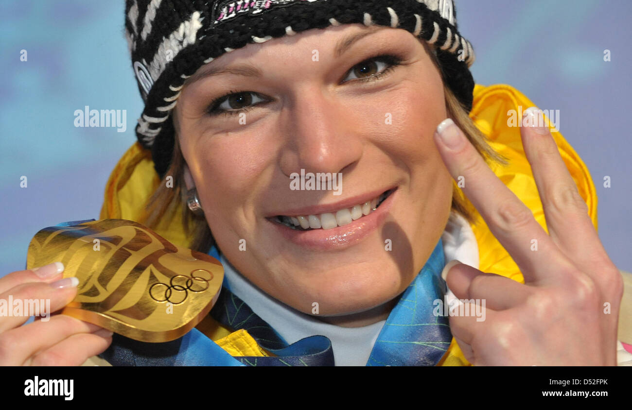 Maria Riesch of Germany celebrates winning the gold medal during the ...