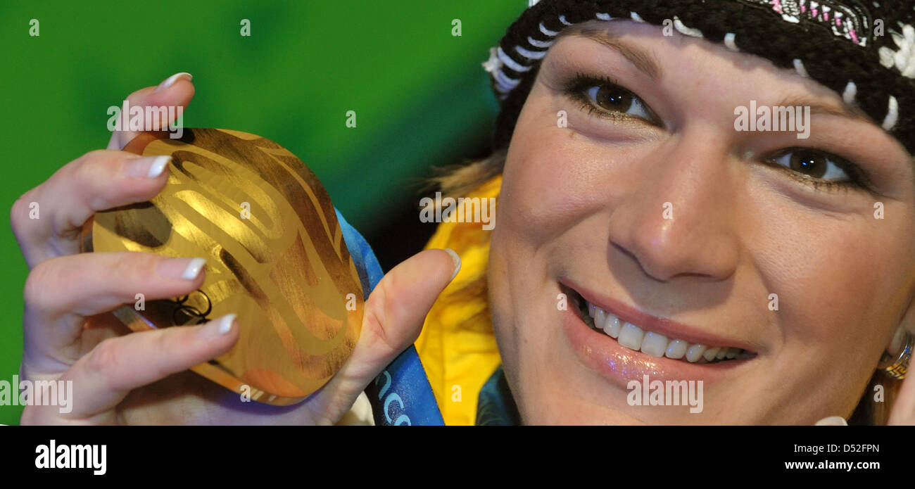 Maria Riesch of Germany celebrates winning the gold medal during the ...