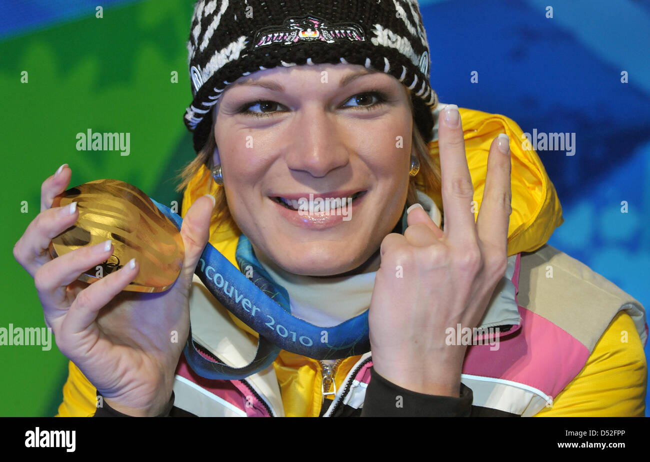 Maria Riesch of Germany celebrates winning the gold medal during the ...