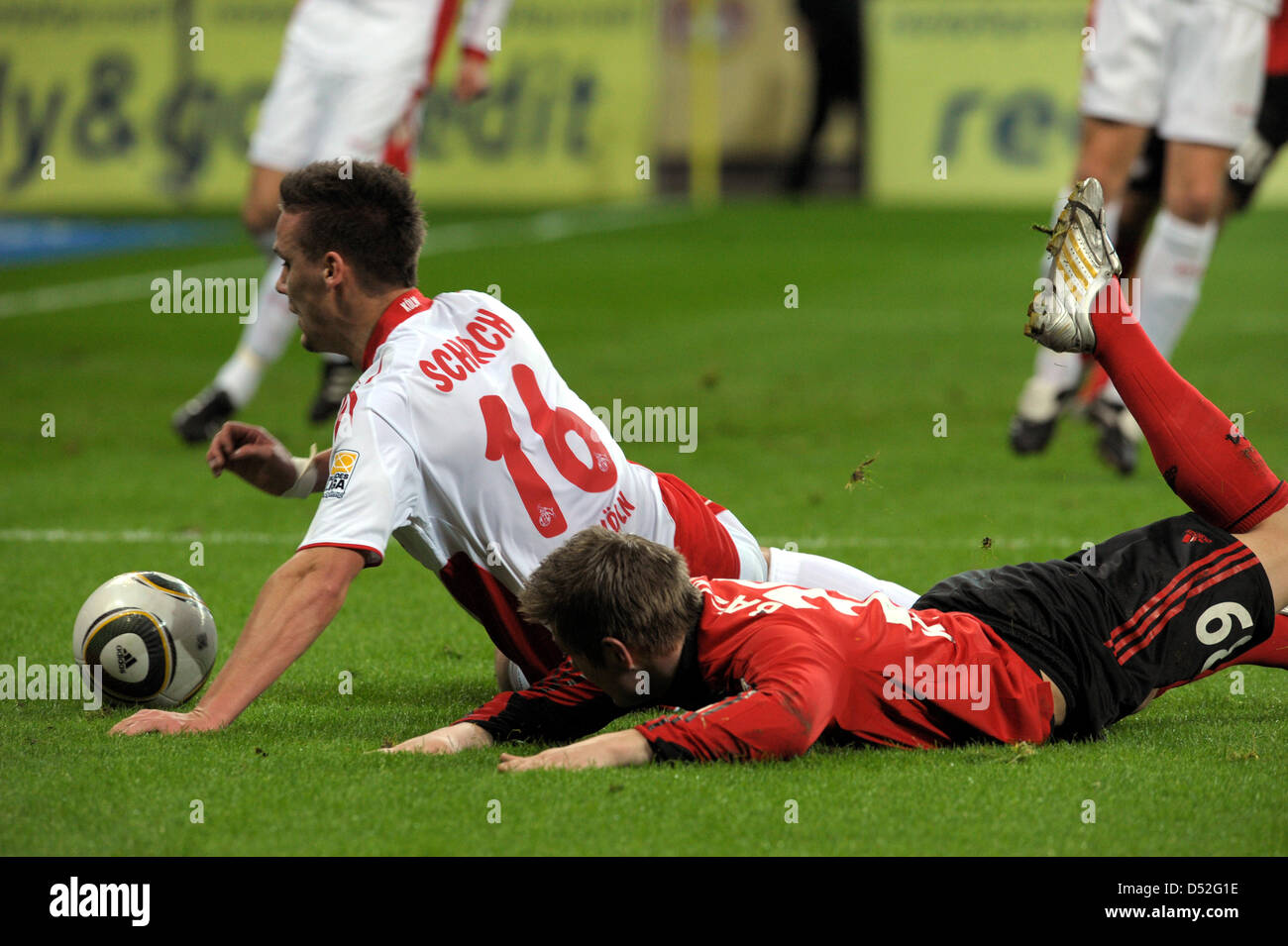 Cologne's Christopher Schorch (L) and Leverkusen's Toni Kroos vie for ...