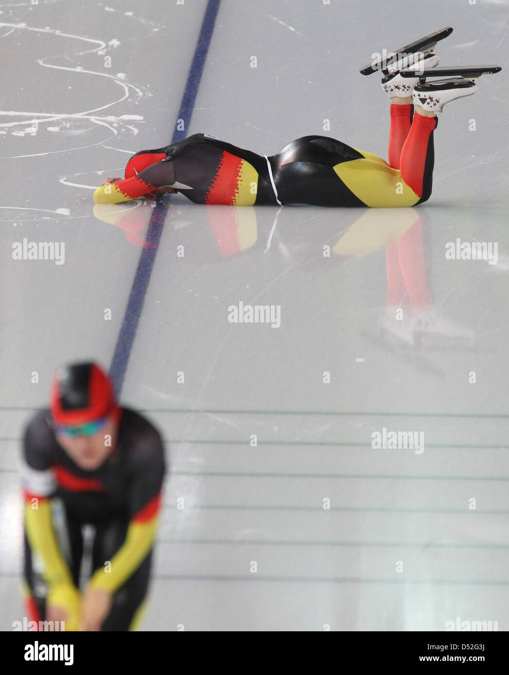 Anni Friesinger-Postma (back) of Germany falls down during the Speed ...