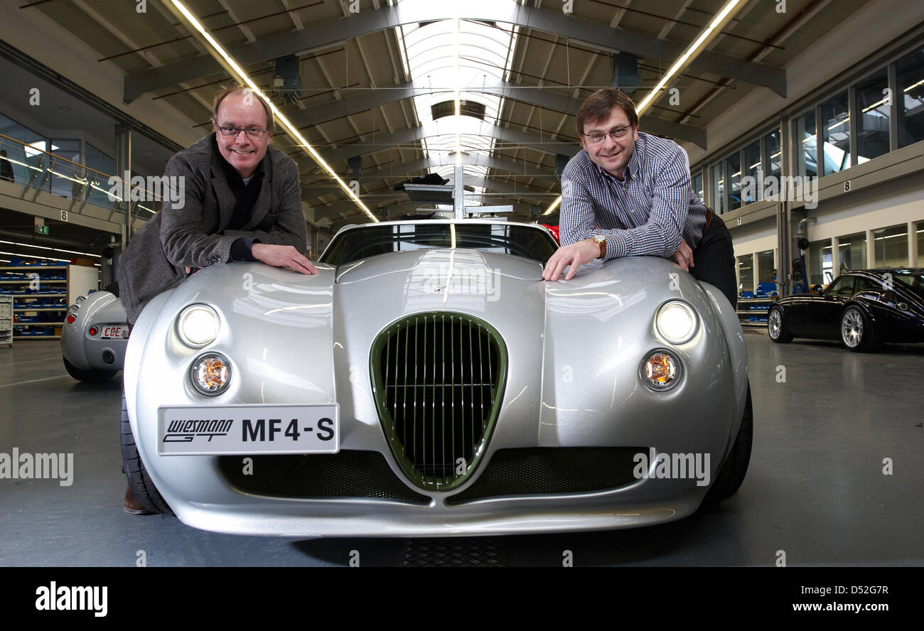 Brothers Friedhelm Wiesmann (L) and Martin Wiesmann pose with a ...