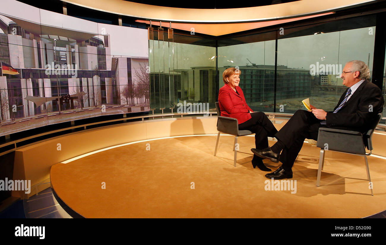 TV presenter Ulrich Deppendorf interviews German Chancellor Angela ...