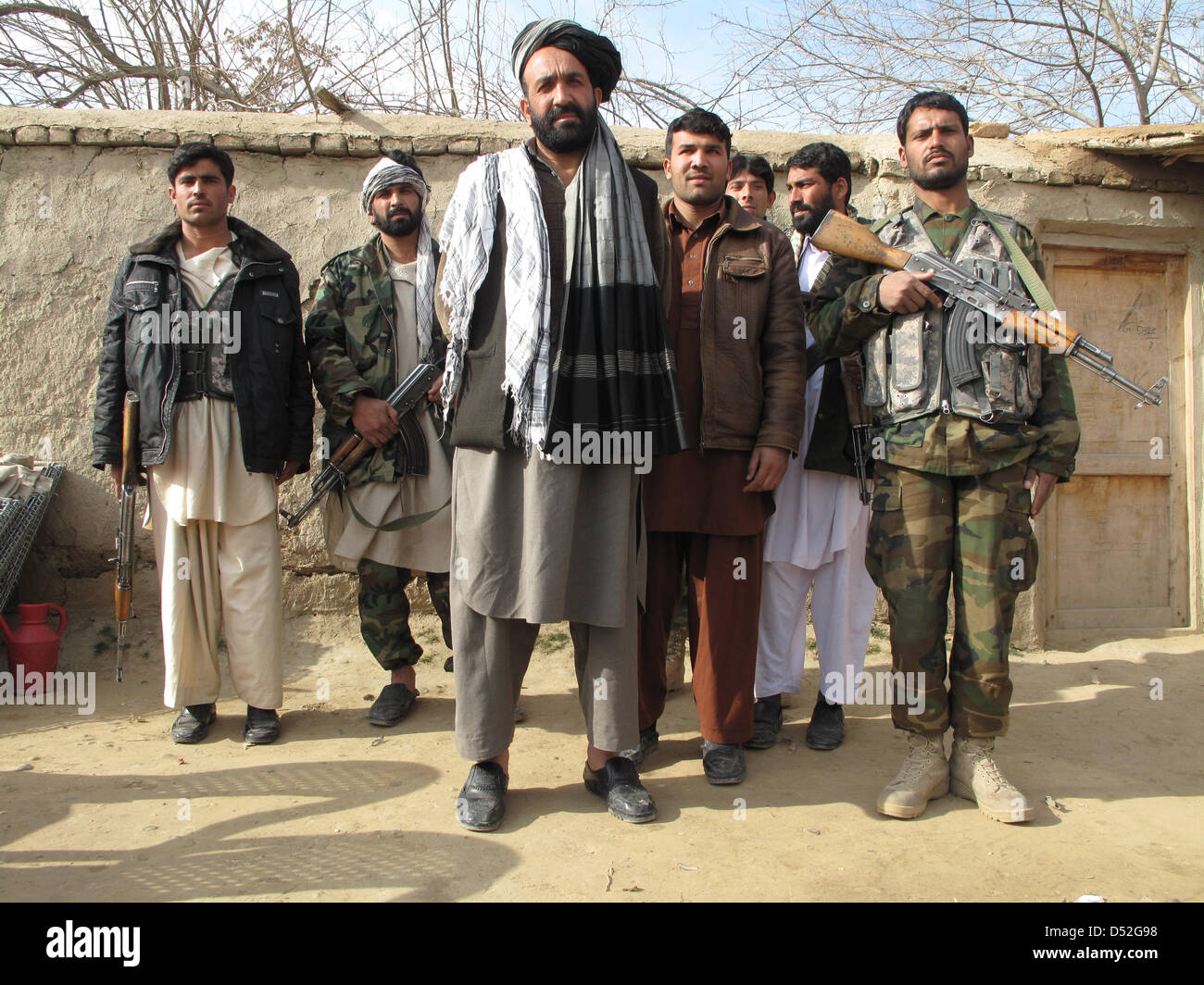 Afghan militia commander Selaab Khan (C) pictured in Kunduz ...
