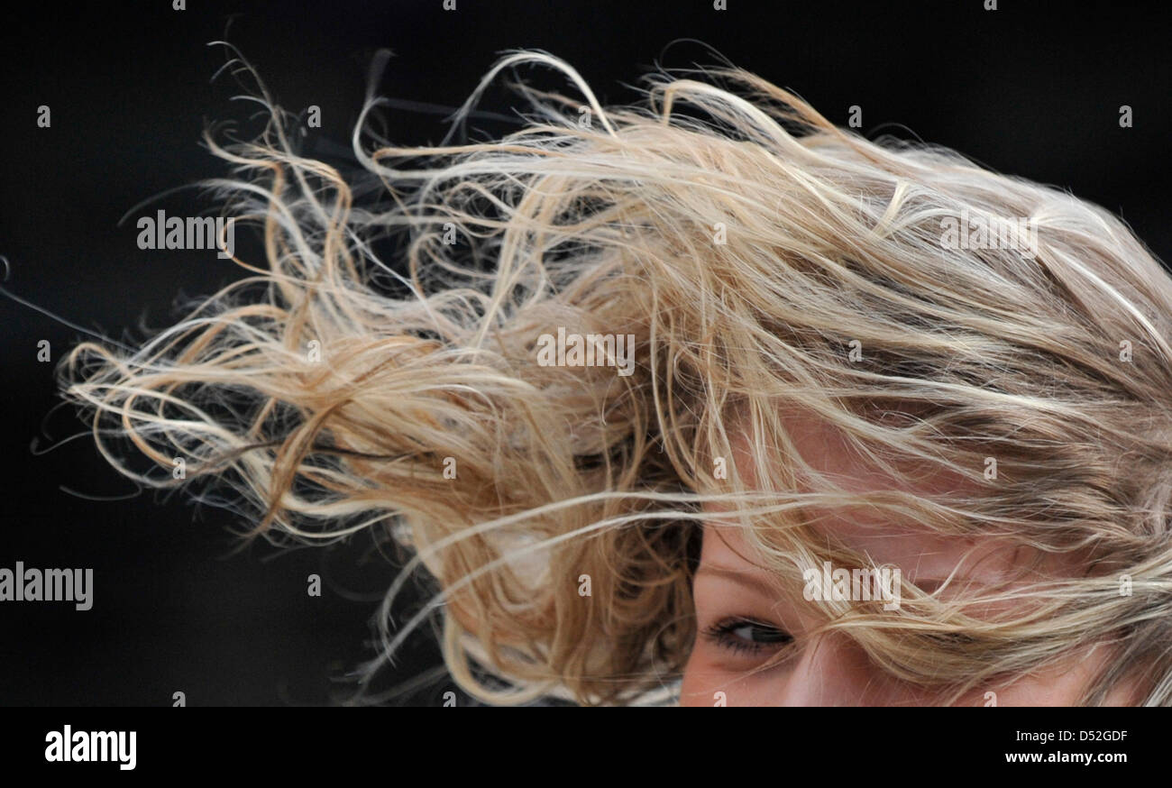 Wind gust blows hair hi-res stock photography and images - Alamy
