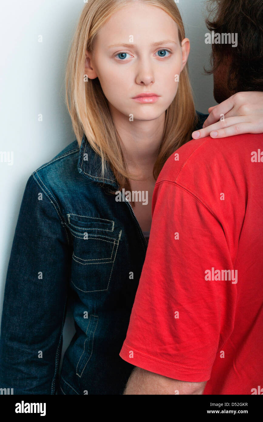 Two serious looking men view two portraits hi-res stock photography and ...