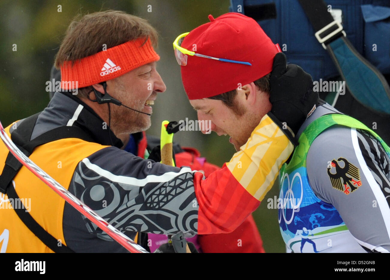 German Coach Jochen Behle (L) and Axel Teichmann of Germany celebrate ...