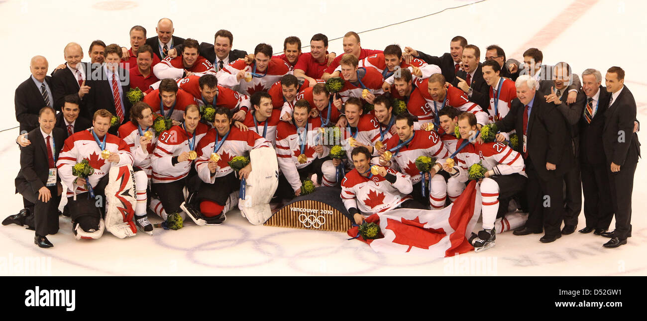Team of Canada celebrate with their gold medals after Mens' Ice Hockey ...