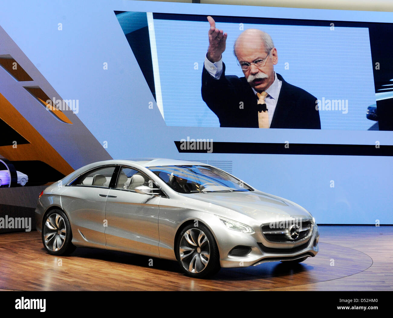 Dieter Zetsche (on the screen), CEO of Daimler AG, presents a Mercedes ...