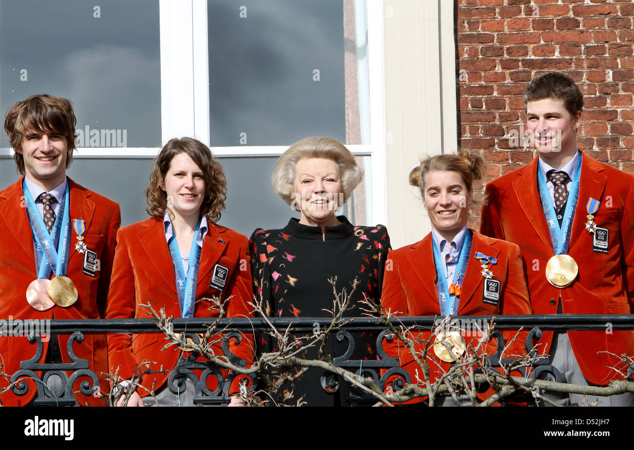 Dutch Queen Beatrix (C) welcomes the medal winners of the Olympic ...