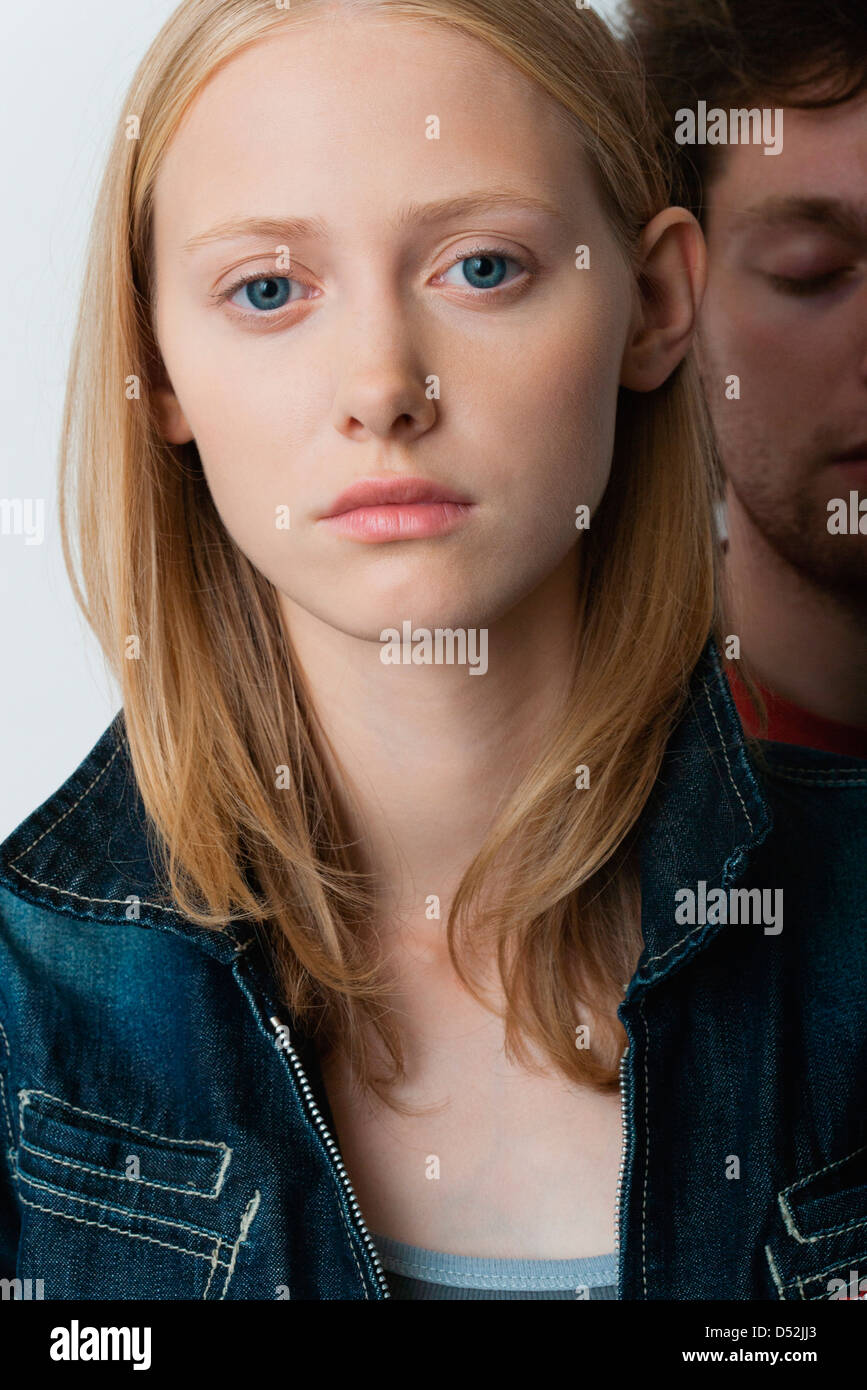 Young woman with unhappy expression, portrait Stock Photo - Alamy