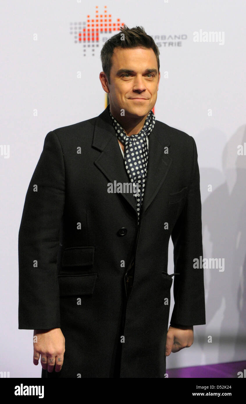 British singer Robbie Williams arrives for the ECHO 2010 award in ...