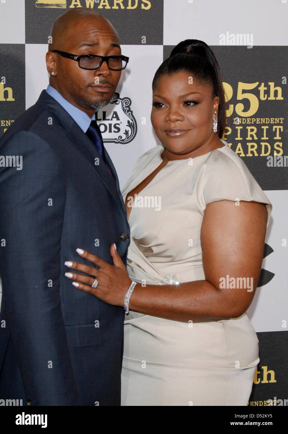 US actress Mo'Nique (R) and her husband Sidney Hicks (L) arrive for the ...