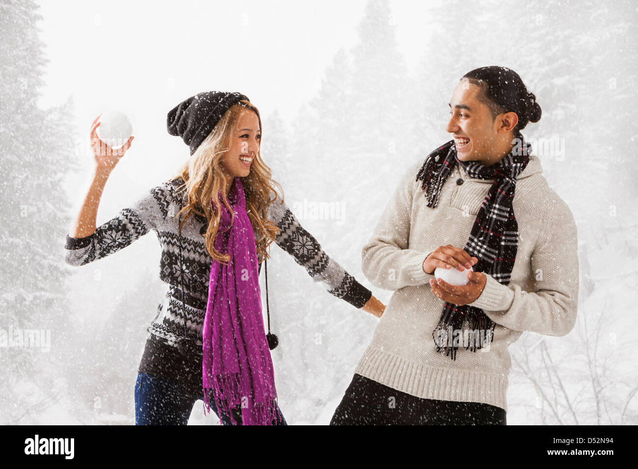 Two people snowball fight on hi-res stock photography and images - Alamy