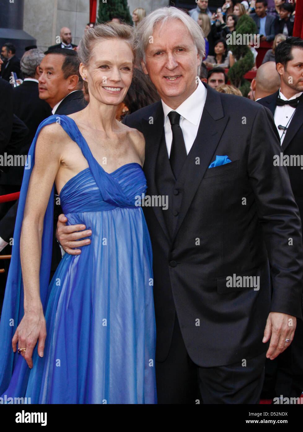 US director James Cameron and his wife Suzy Amis arrive on the red ...