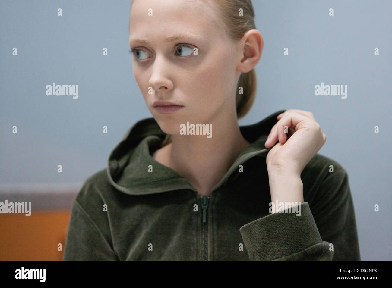 Young woman looking away, portrait Stock Photo - Alamy