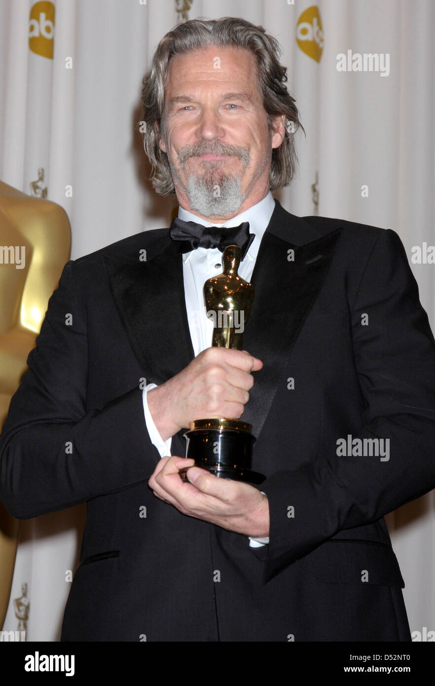 US actor Jeff Bridges poses with his Oscar in the press room at the ...