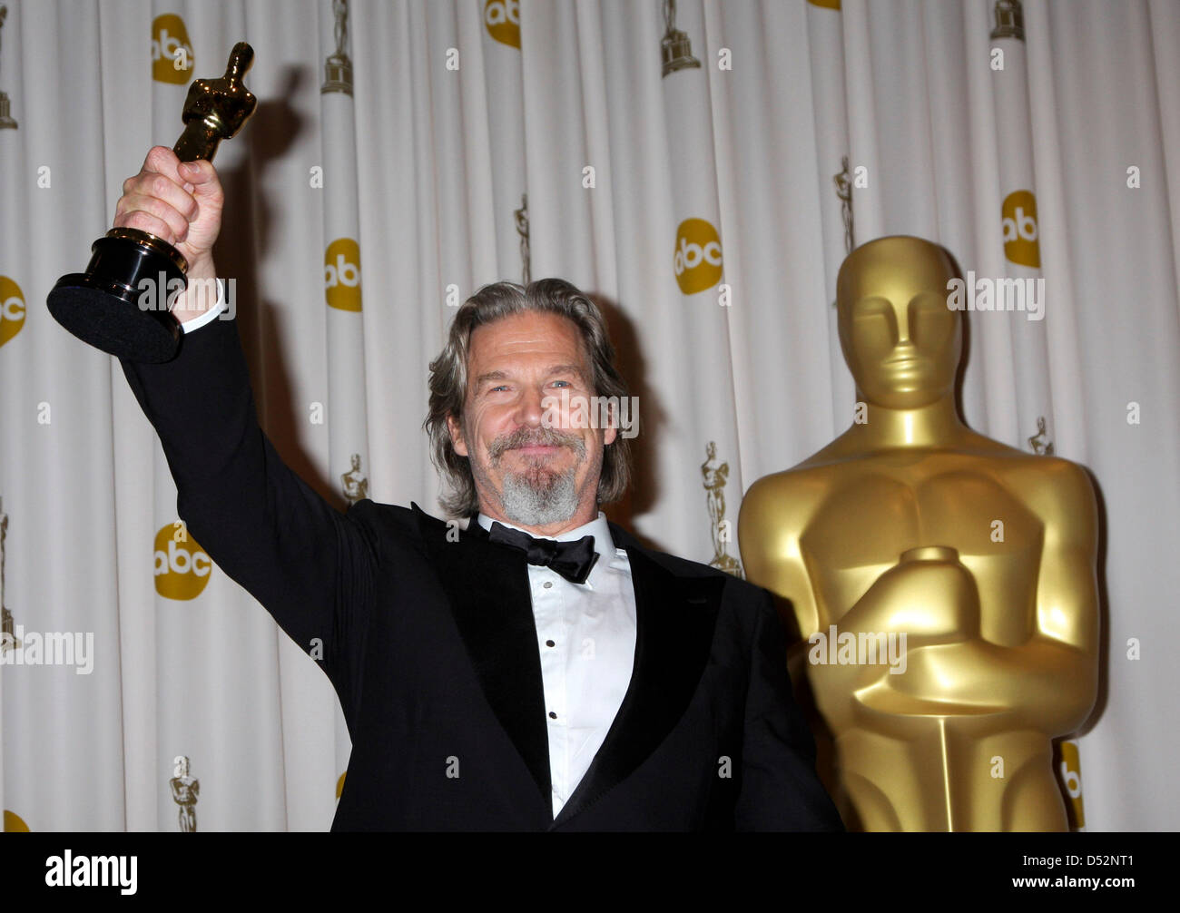 US actor Jeff Bridges poses with his Oscar in the press room at the ...