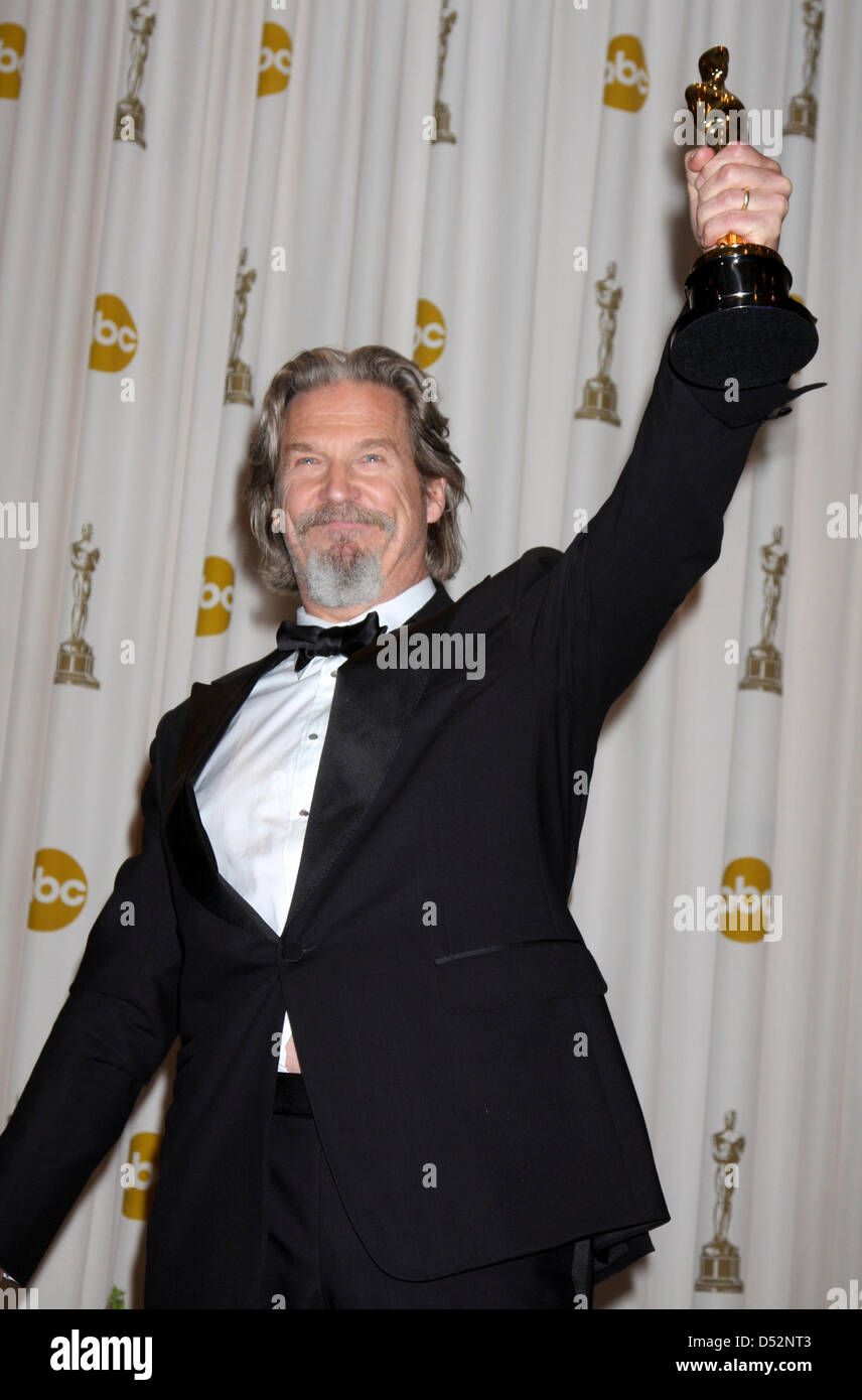 US actor Jeff Bridges poses with his Oscar in the press room at the ...
