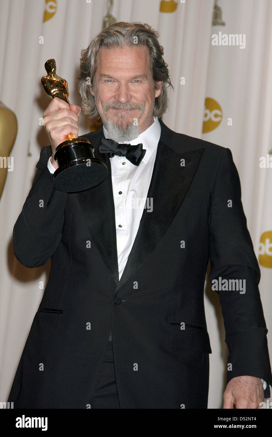 US actor Jeff Bridges poses with his Oscar in the press room at the ...