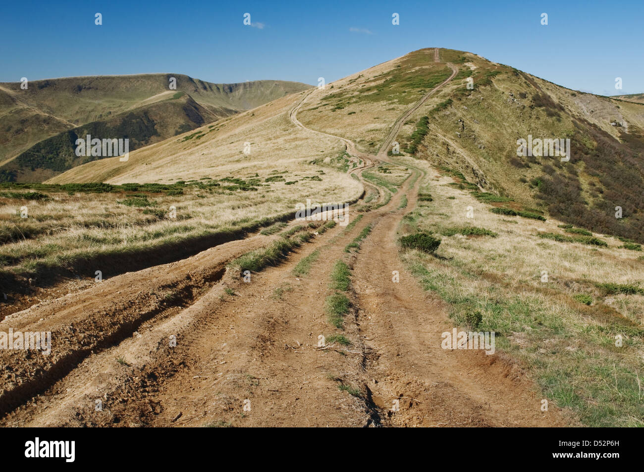 dirt road in high mountains Stock Photo - Alamy