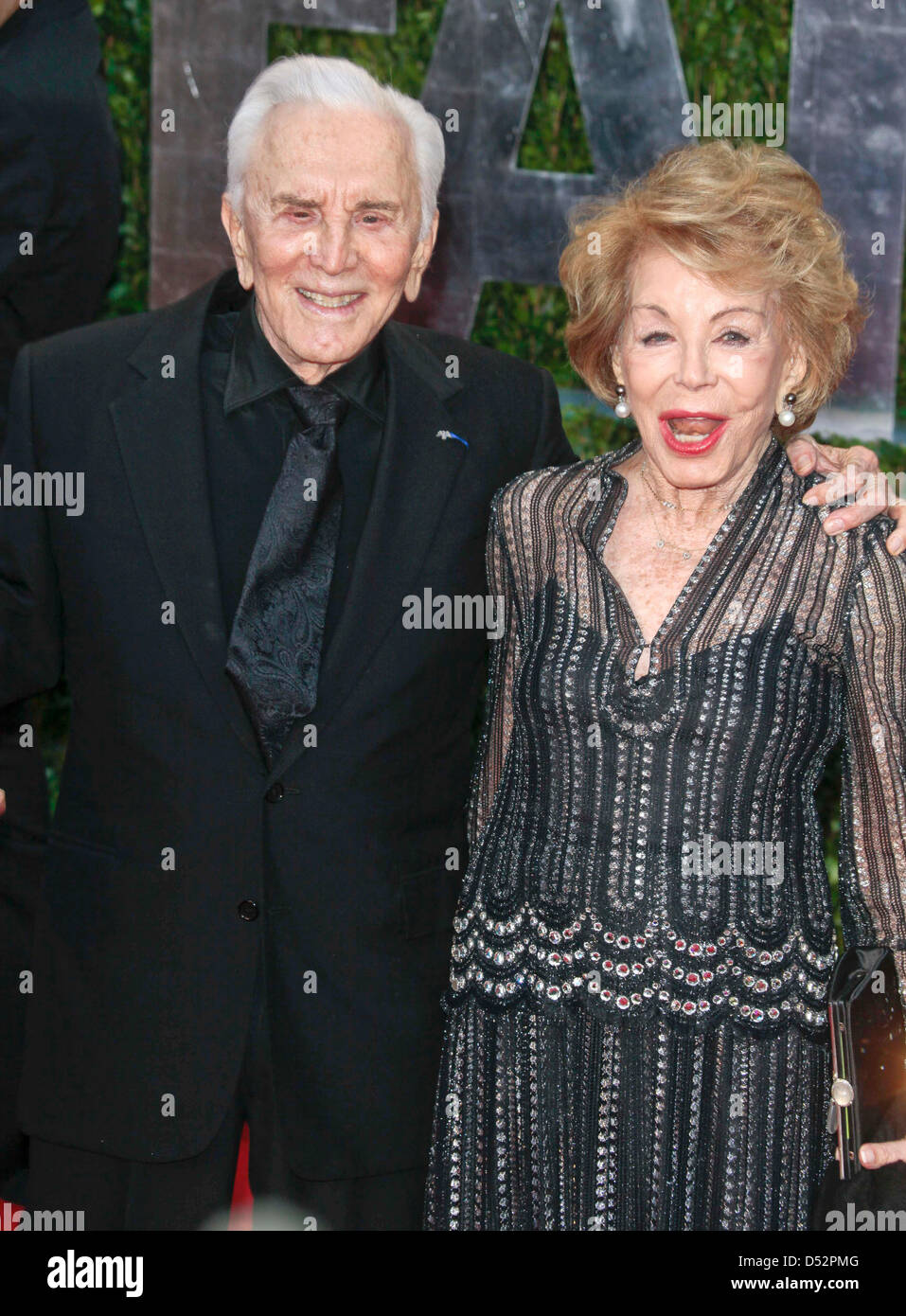 US actor Kirk Douglas and his wife Anne Buydens arrive at the Vanity Fair Oscar Party at Sunset ...