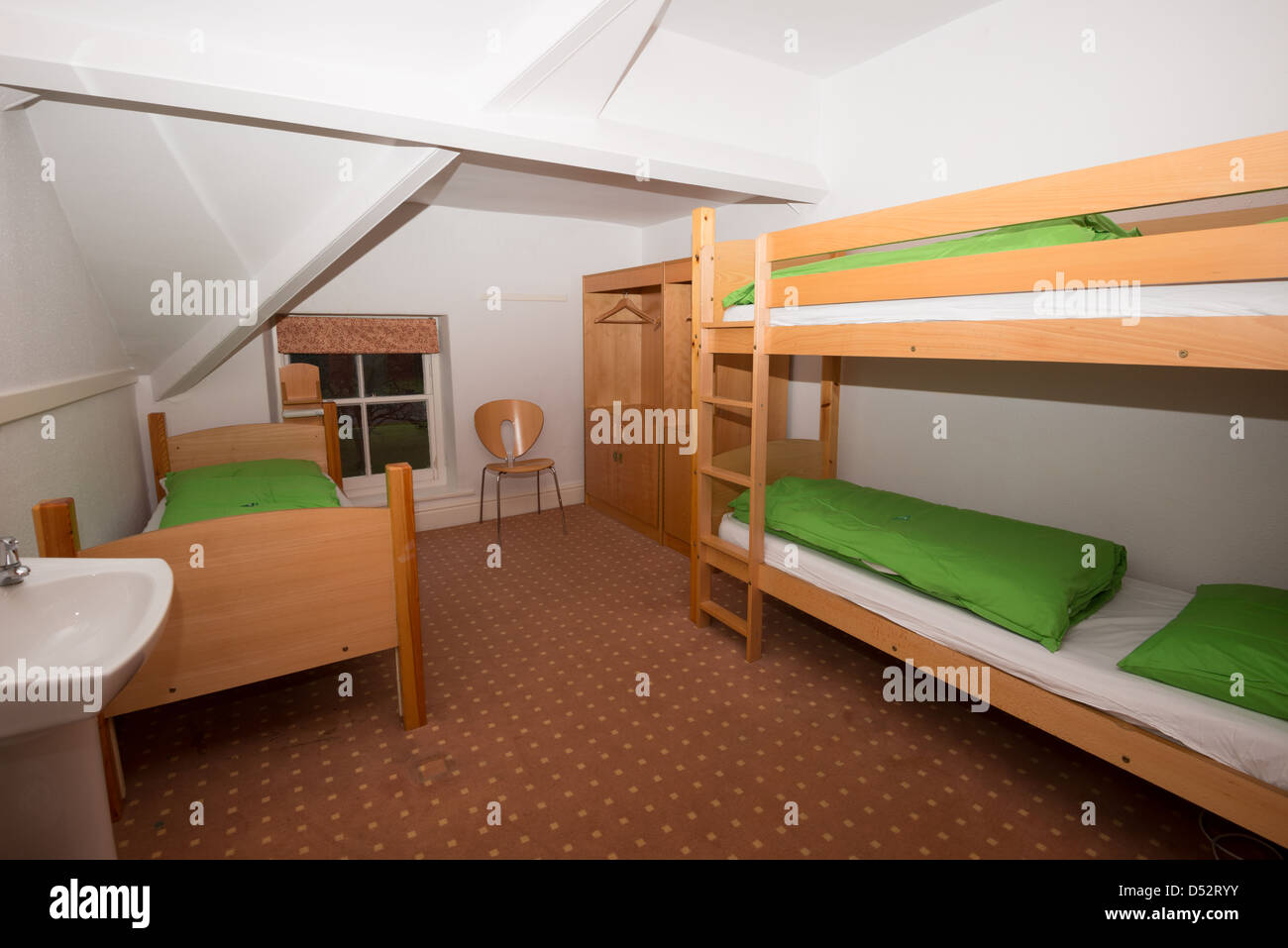 Hostel room bunk beds hi-res stock photography and images - Alamy