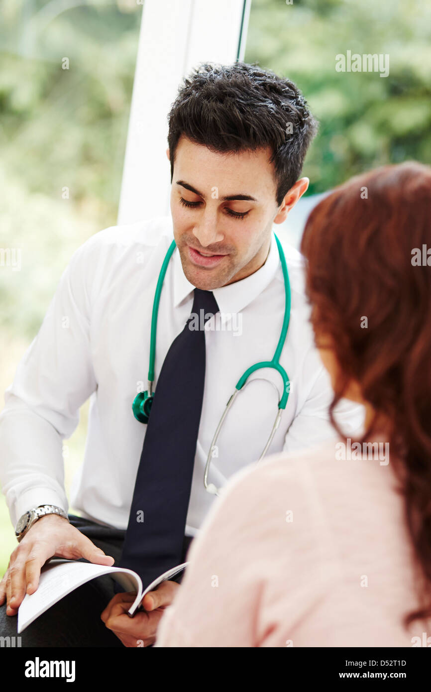 Doctor talking to patient Stock Photo - Alamy