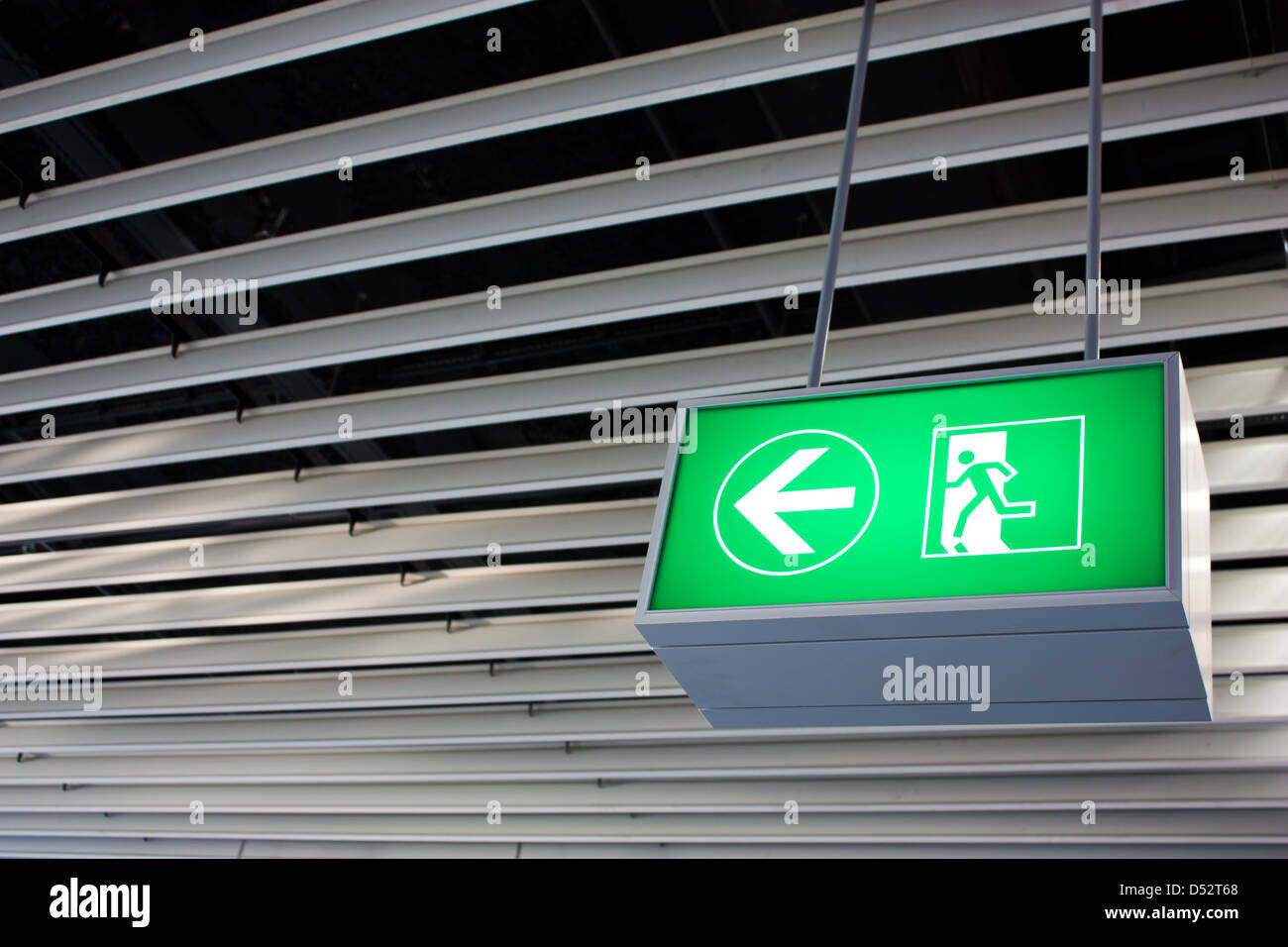 Emergency exit sign in modern offices inside an industrial plant Stock ...
