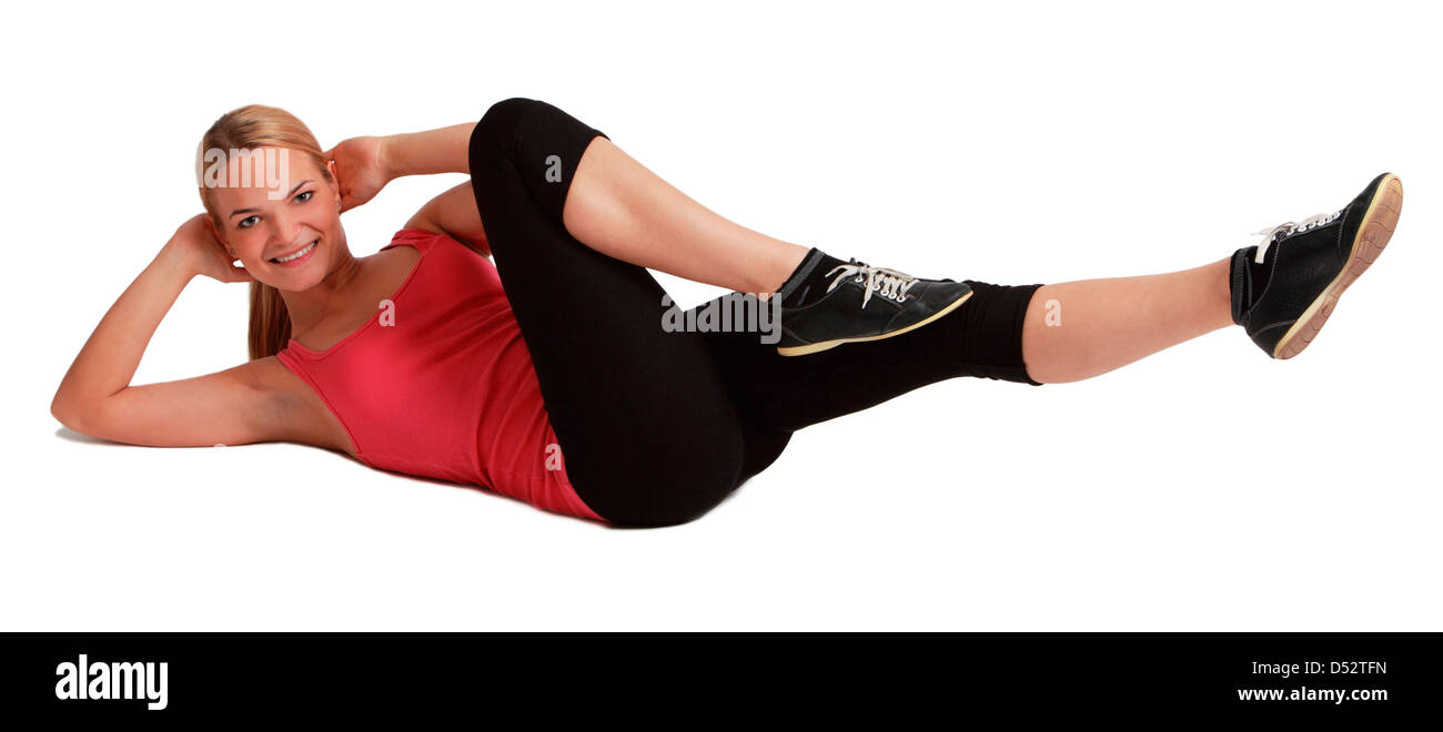 Woman doing sit-ups, isolated against a white background Stock Photo ...