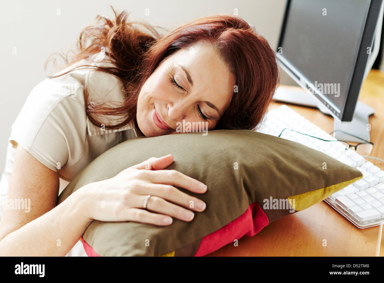Woman fallen asleep at work Stock Photo - Alamy