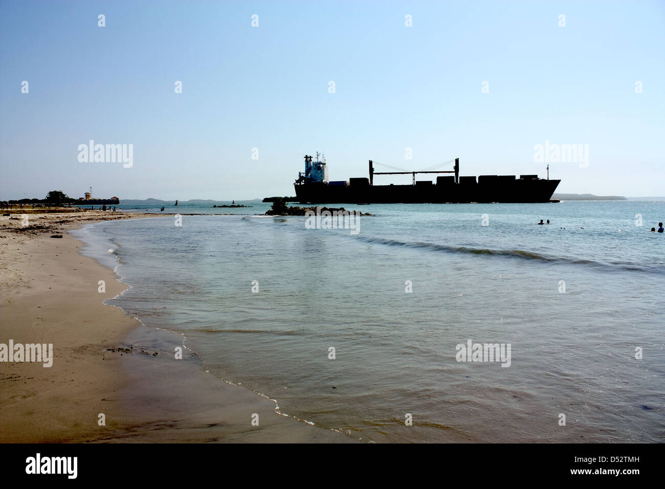 Transport ship in Caribbean beach Stock Photo - Alamy