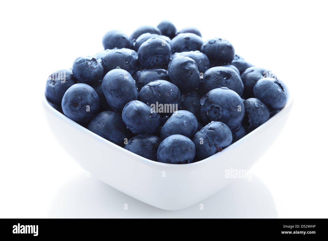 Organic blueberries in high resolution in a white bowl Stock Photo - Alamy