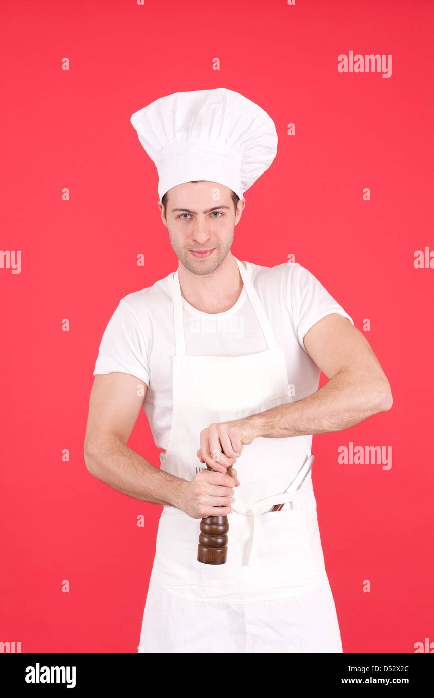 chef shot in red background Stock Photo - Alamy
