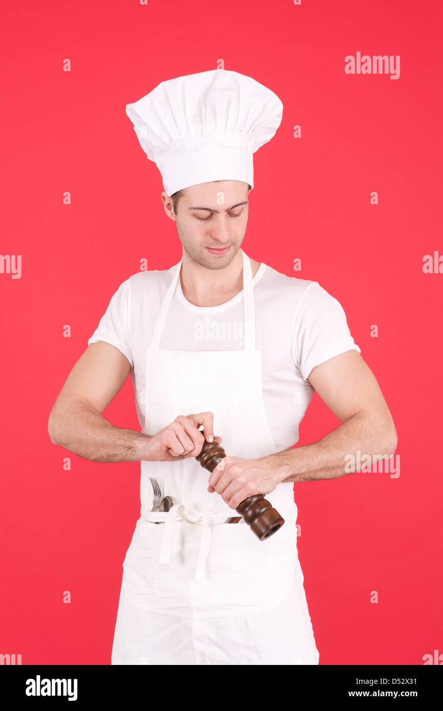 chef shot in red background Stock Photo - Alamy