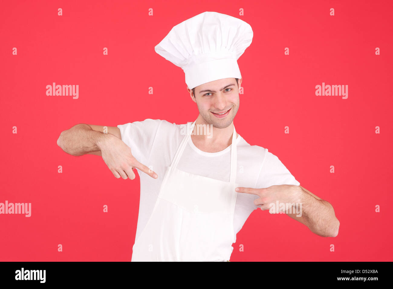 chef shot in red background Stock Photo - Alamy